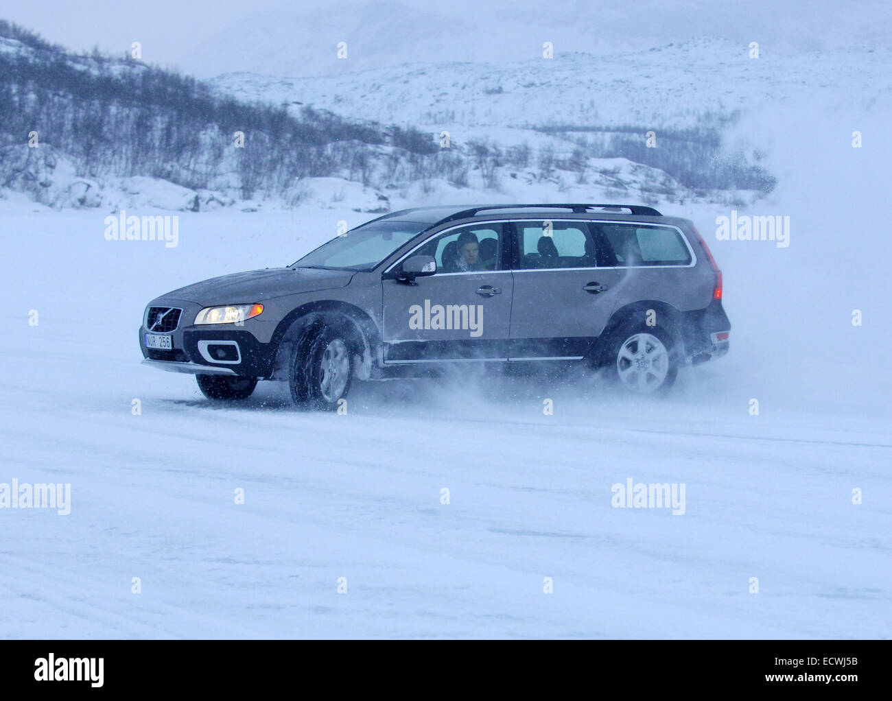 Car driving on snow and ice near the arctic circle in Sweden. Volvo ...