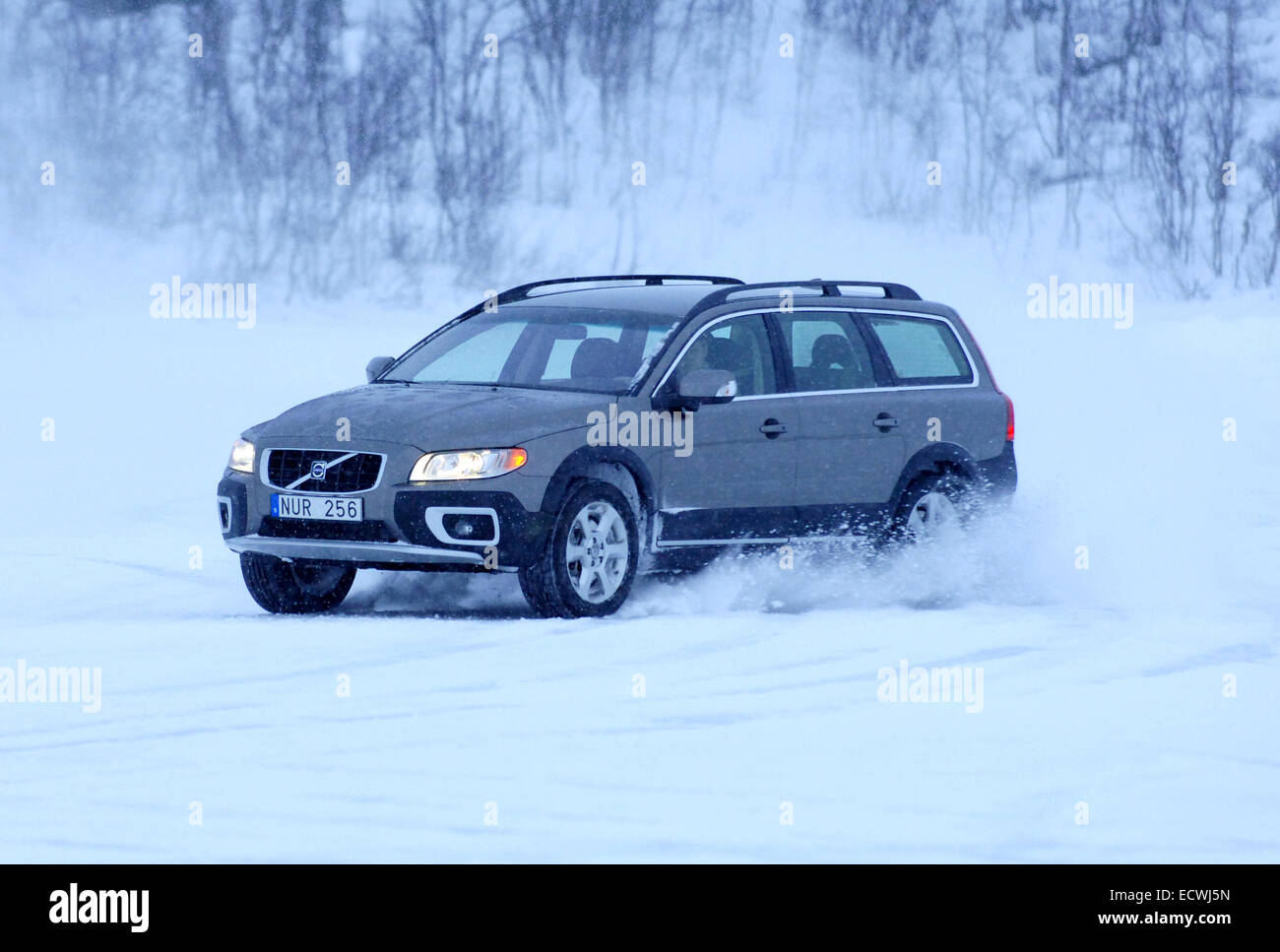 Car driving on snow and ice near the arctic circle in Sweden. Volvo ...