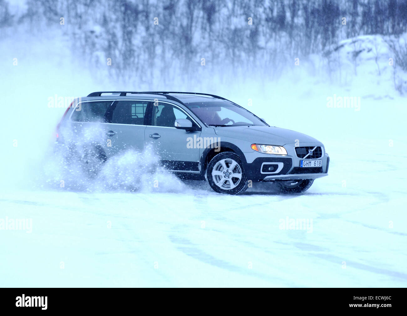 Car driving on snow and ice near the arctic circle in Sweden. Volvo ...