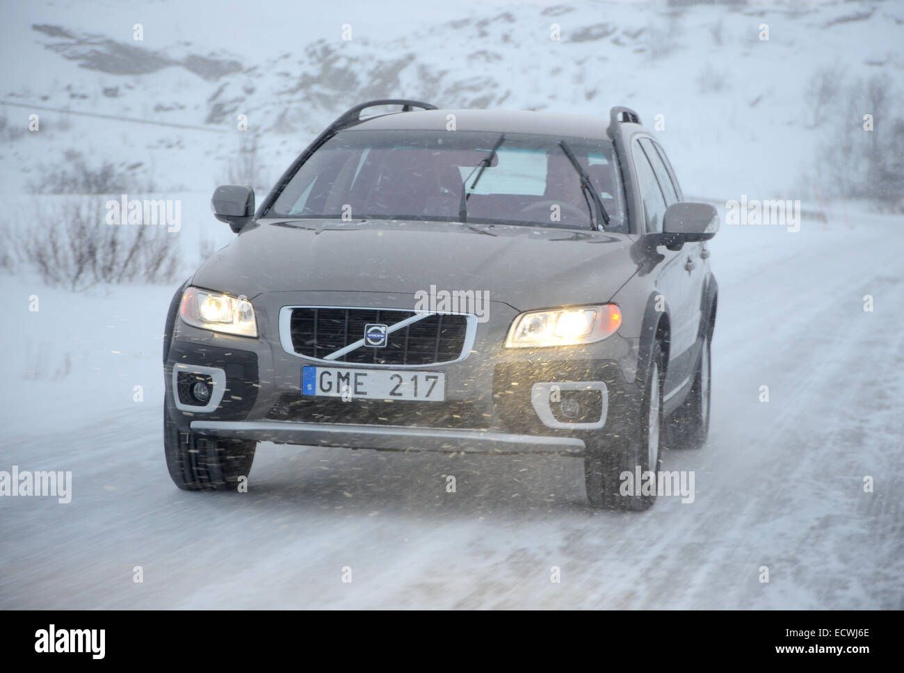 Car driving on snow and ice near the arctic circle in Sweden. Volvo ...