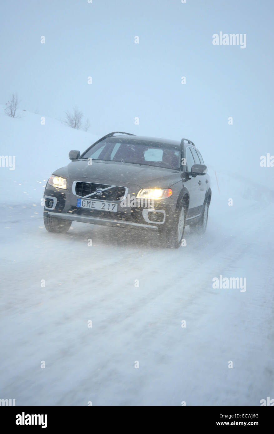 Car driving on snow and ice near the arctic circle in Sweden. Volvo ...