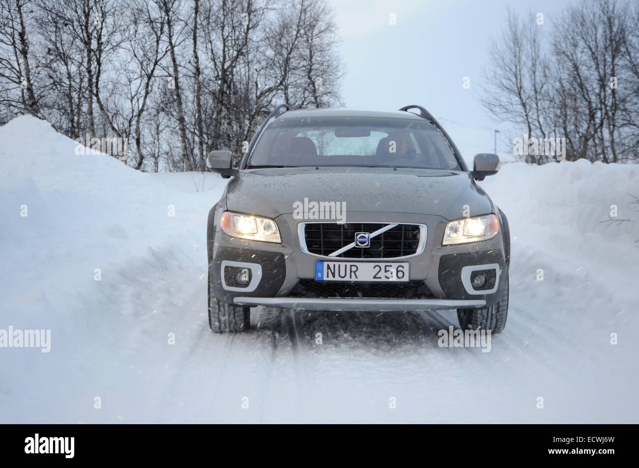 Car driving on snow and ice near the arctic circle in Sweden. Volvo ...