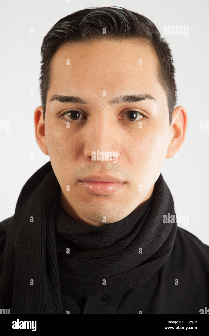 Handsome man in black t-shirt, looking at the camera thoughtfully Stock ...