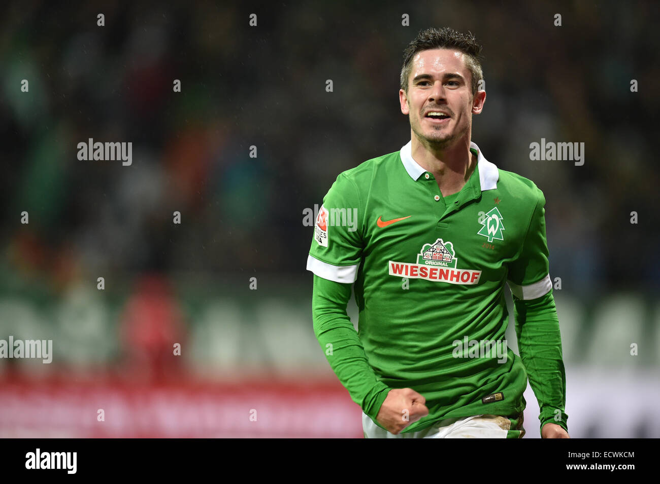 Bremen, Germany. 20th Dec, 2014. Werder's Fin Bartels cheers after his ...