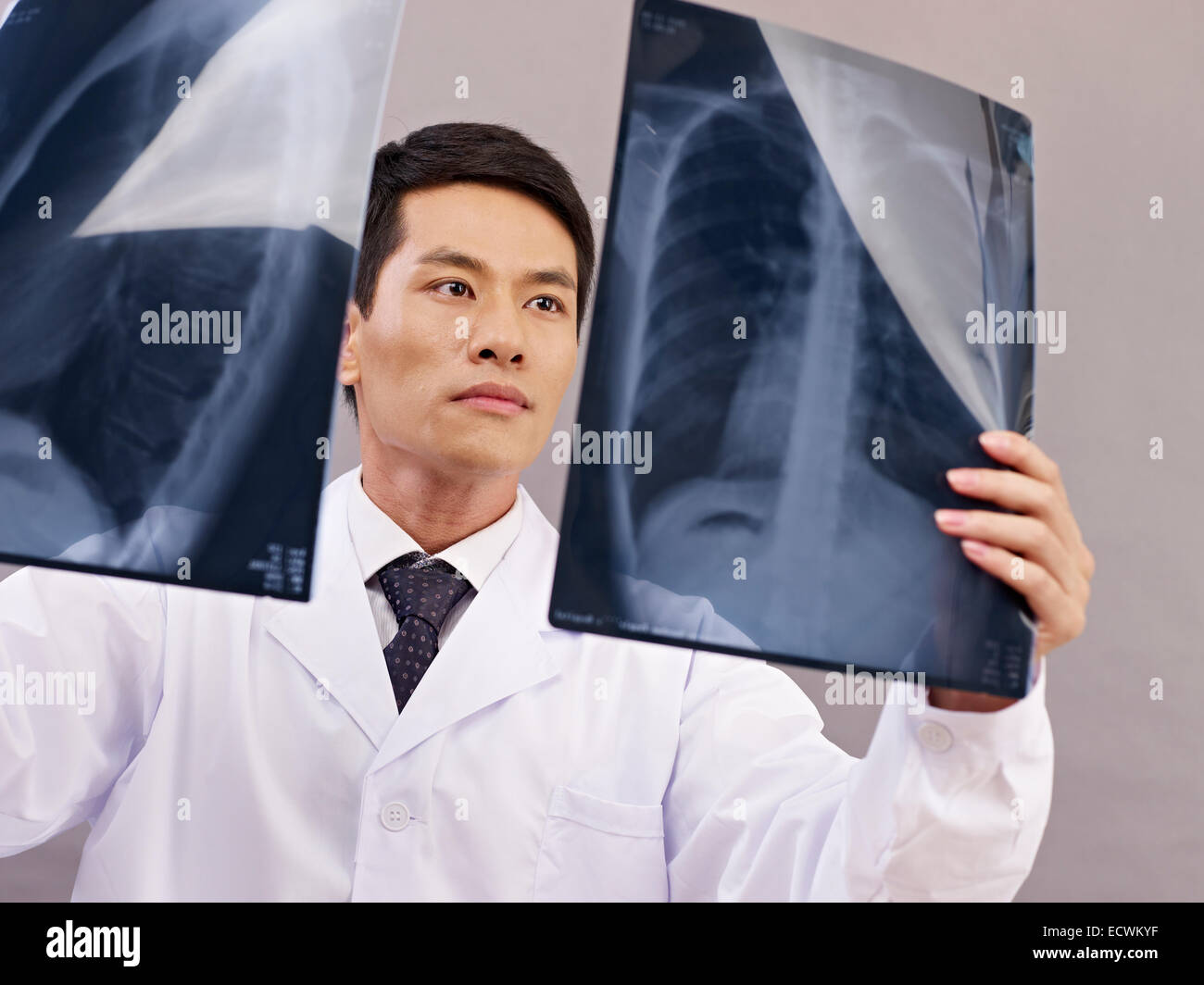 asian doctor at work Stock Photo - Alamy