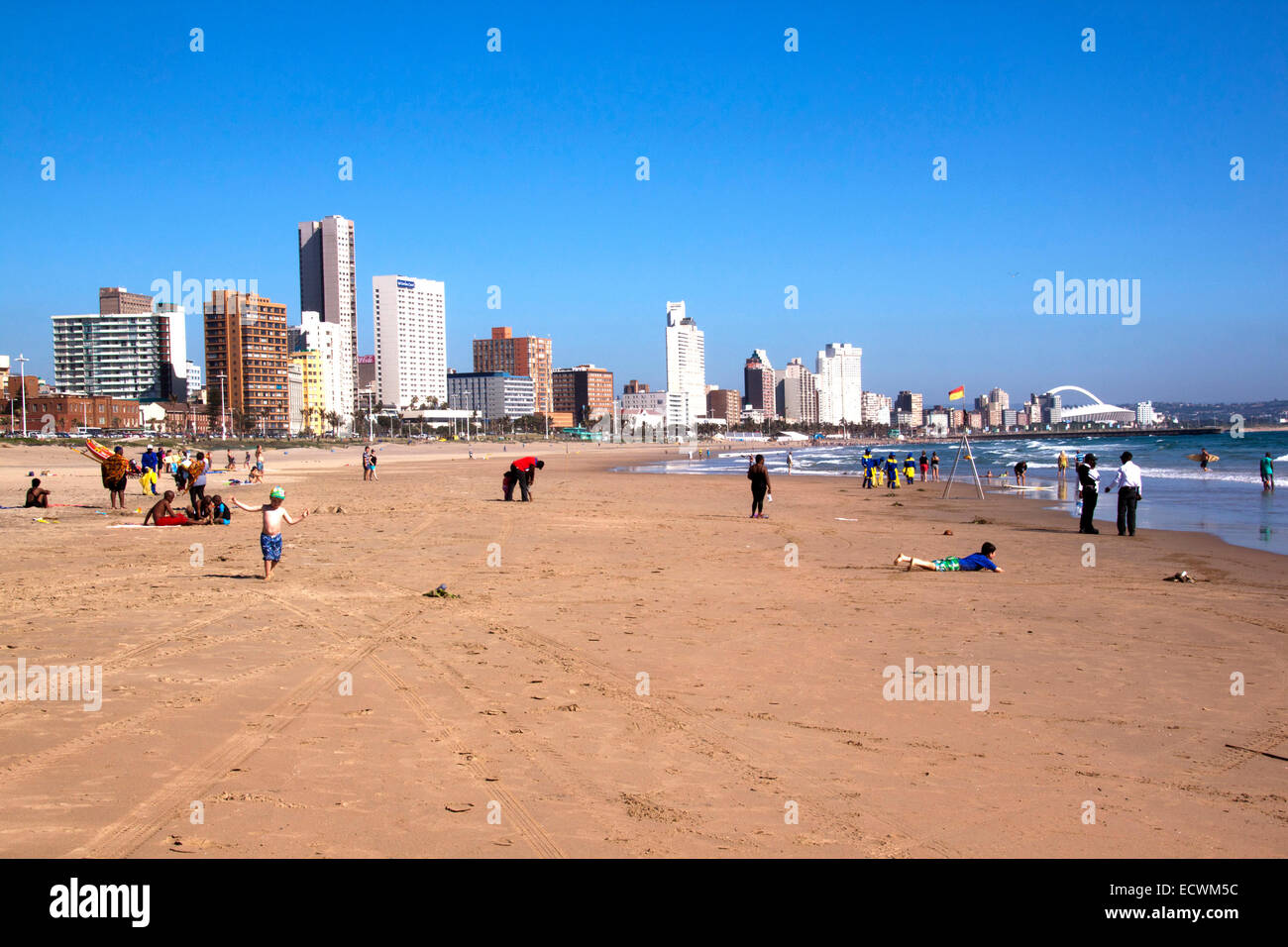 Many unknown people on Addington Beach against "Golden Mile" city ...