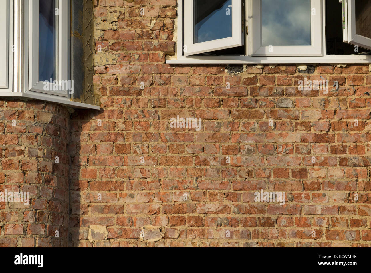 House stripped of render so that its bricks are shown again, ready to ...
