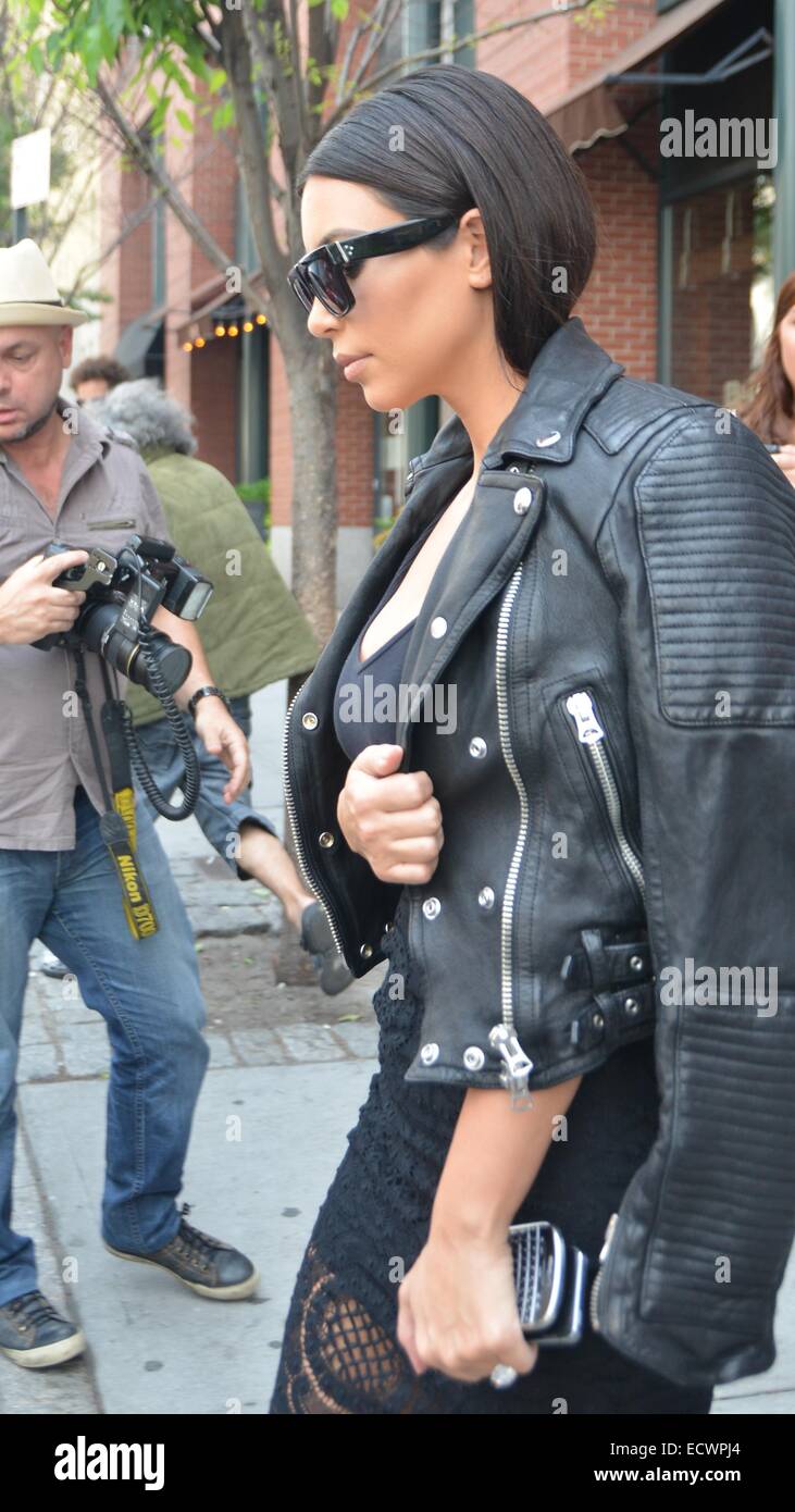 Newlywed Kim Kardashian spotted in Soho dressed in black from head-to ...