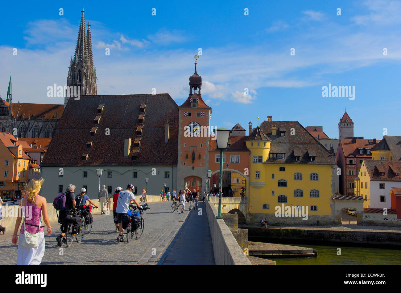 Regensburg, Stone bridge over Danube River, S. Peter Cathedral ...