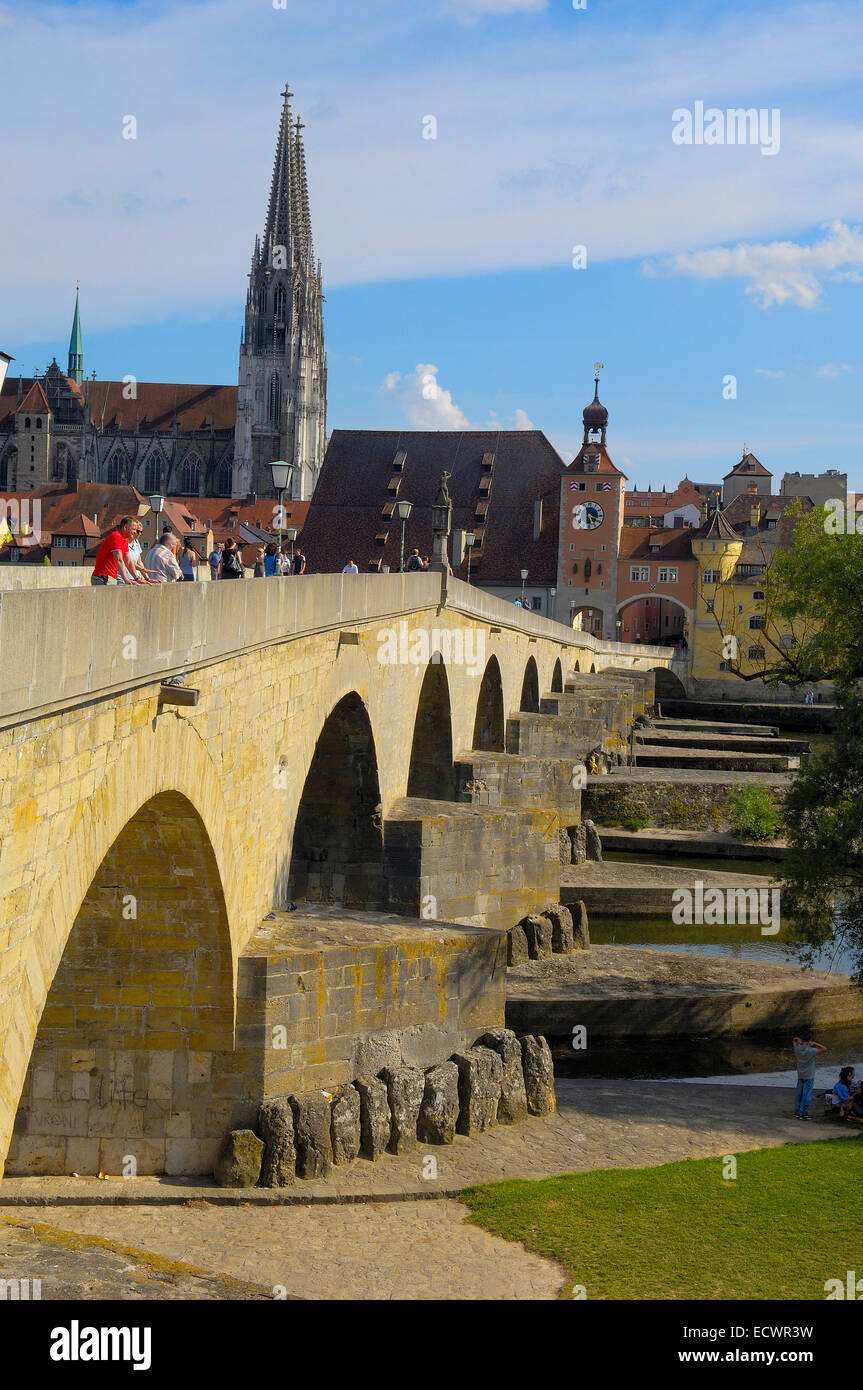 Regensburg, Stone bridge over Danube River, S. Peter Cathedral ...