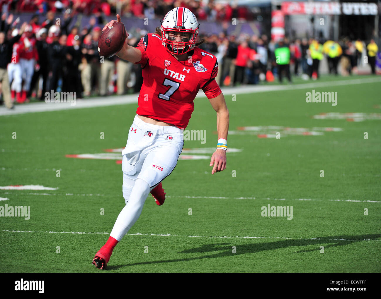 Las Vegas, NV, USA. 20th Dec, 2014. Travis Wilson #7 runs a QB Keeper ...