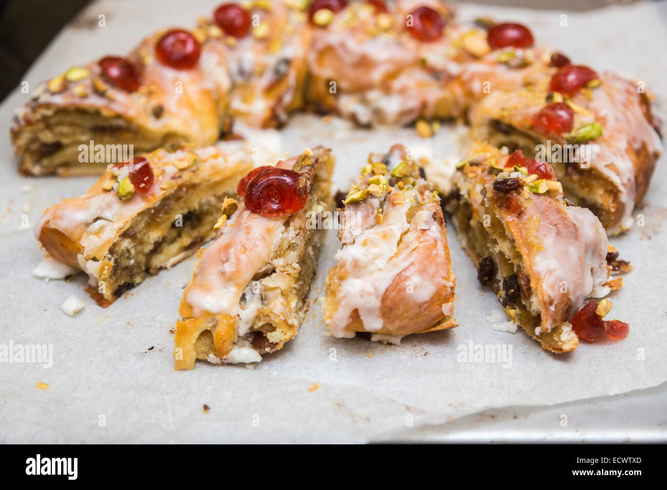 Mincemeat and marzipan couronne with glacé cherries decoration as ...