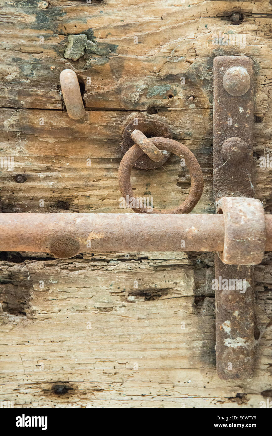 an antique iron latch on an old wooden door Stock Photo - Alamy