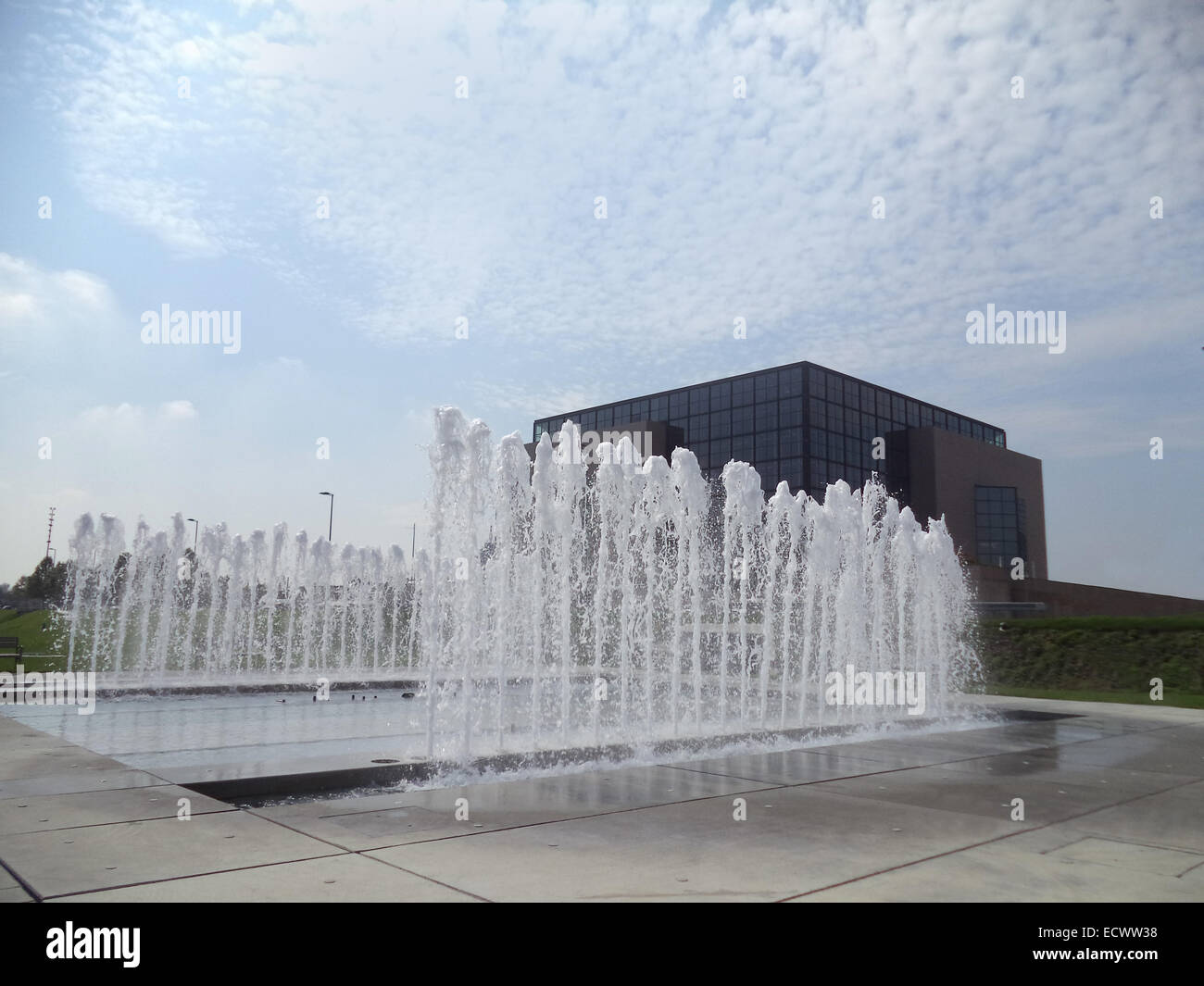 Water stream splashing on ground Stock Photo - Alamy