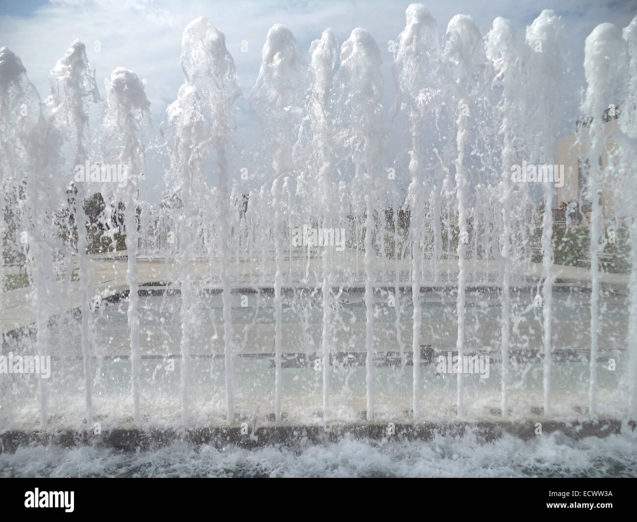 Water stream splashing on ground Stock Photo - Alamy