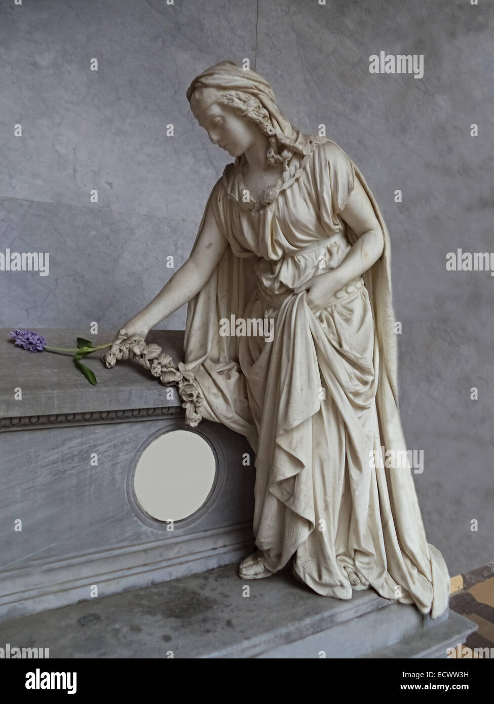 Statue of woman on tomb as a symbol of depression pain sorrow and death ...