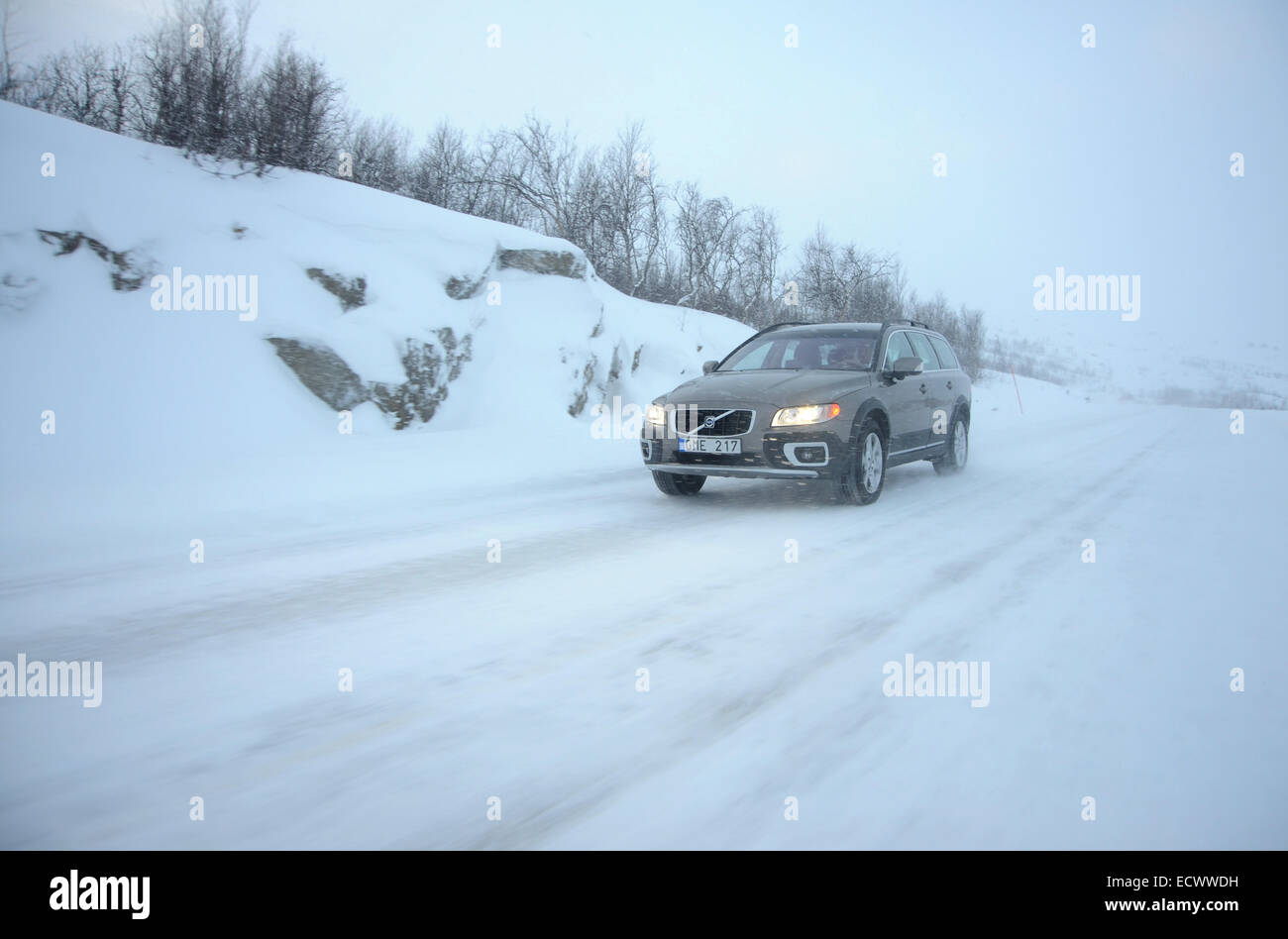 Car driving on snow and ice near the arctic circle in Sweden. Volvo ...