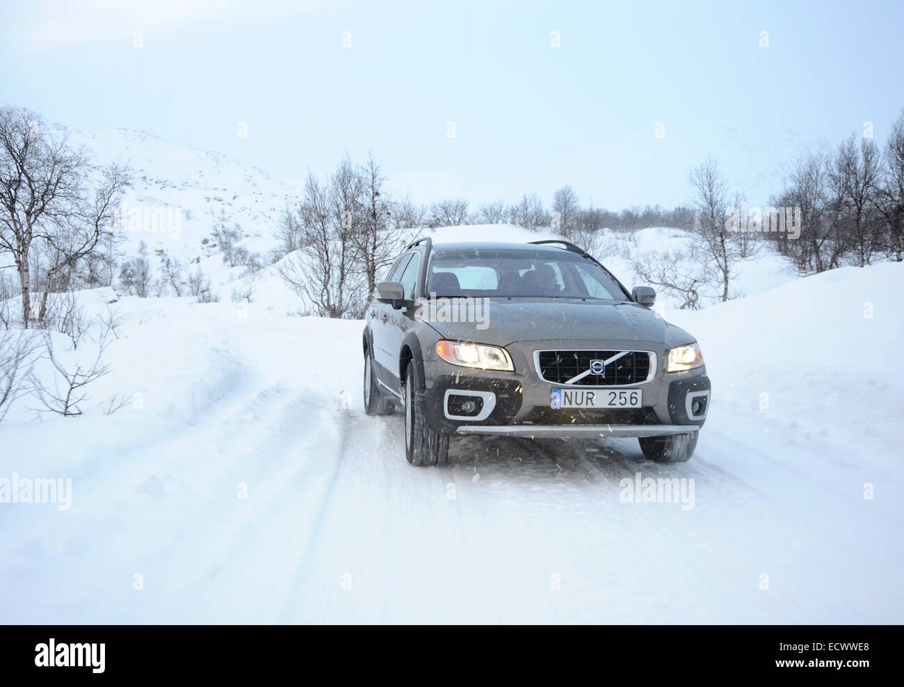 Car driving on snow and ice near the arctic circle in Sweden. Volvo ...