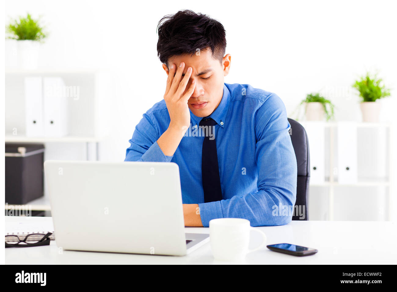 stressed business man in the office Stock Photo - Alamy