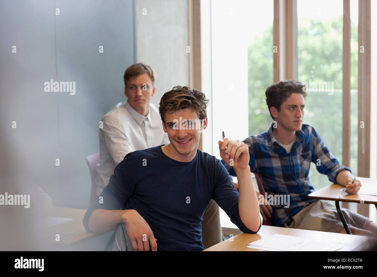 Students sitting desk classroom hi-res stock photography and images - Alamy