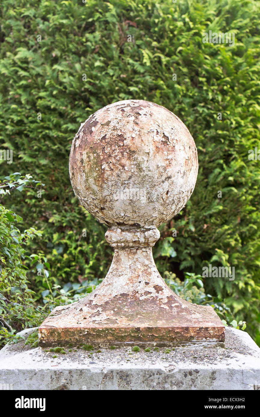 A weathered stone wall bollard Stock Photo - Alamy