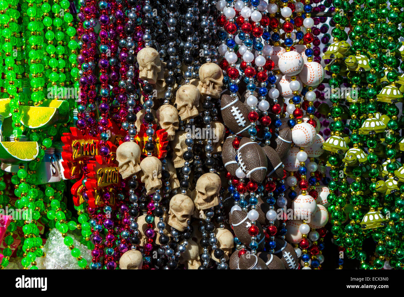 Closeup of a variety of Mardi Gras colorful beads at a festival in ...