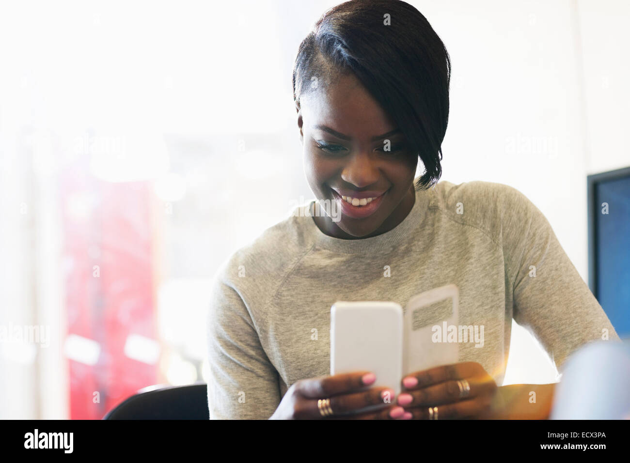 University student texting on break Stock Photo - Alamy