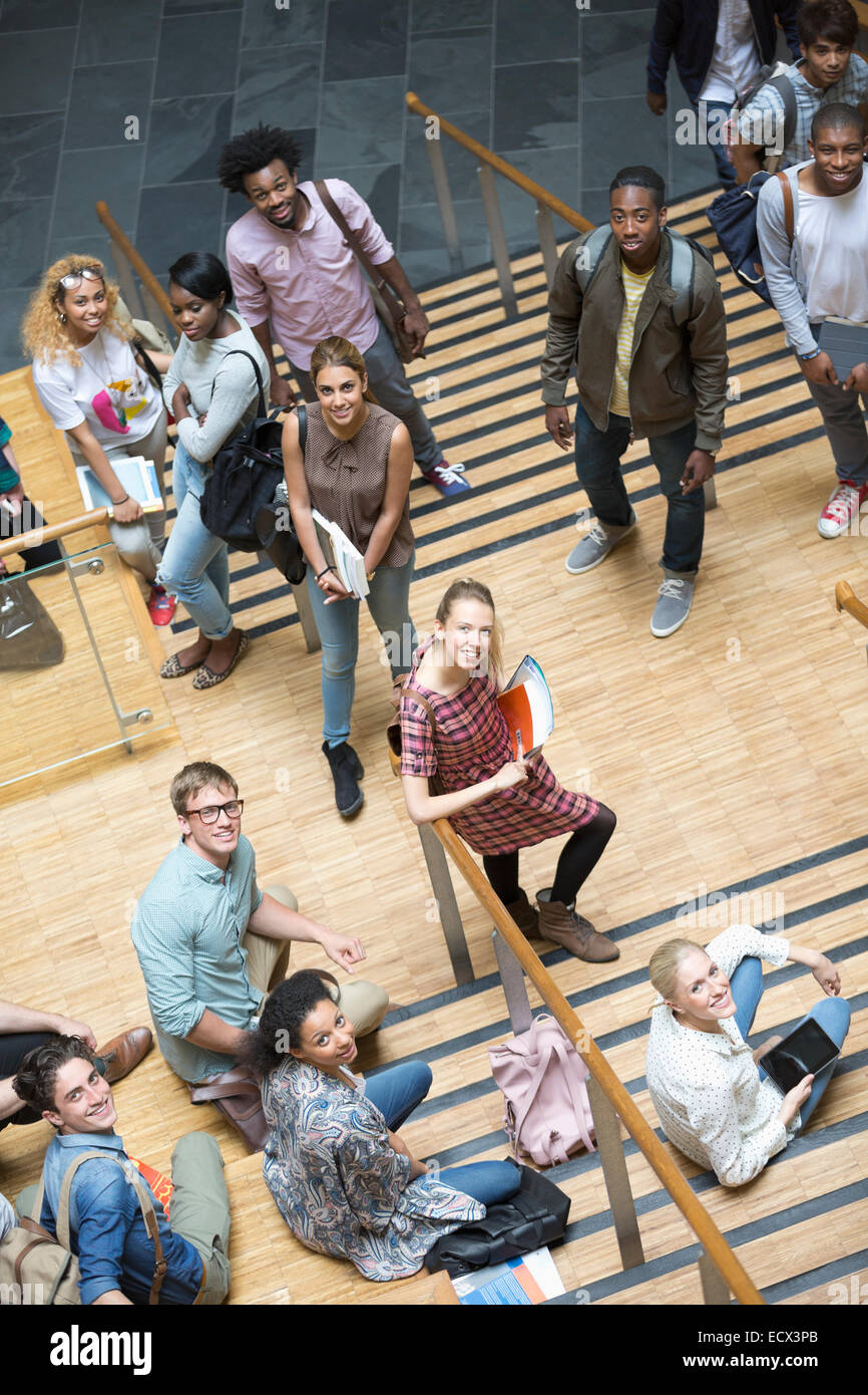 Portrait of university students standing on staircase Stock Photo - Alamy