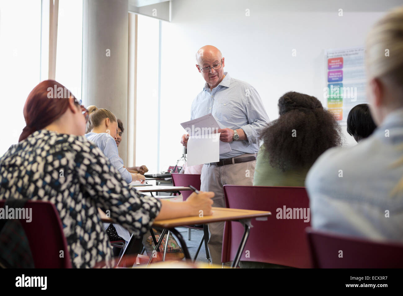 Female teacher giving results hi-res stock photography and images - Alamy