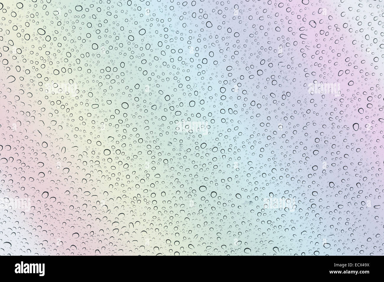 colorful water drops on a window for design Stock Photo - Alamy
