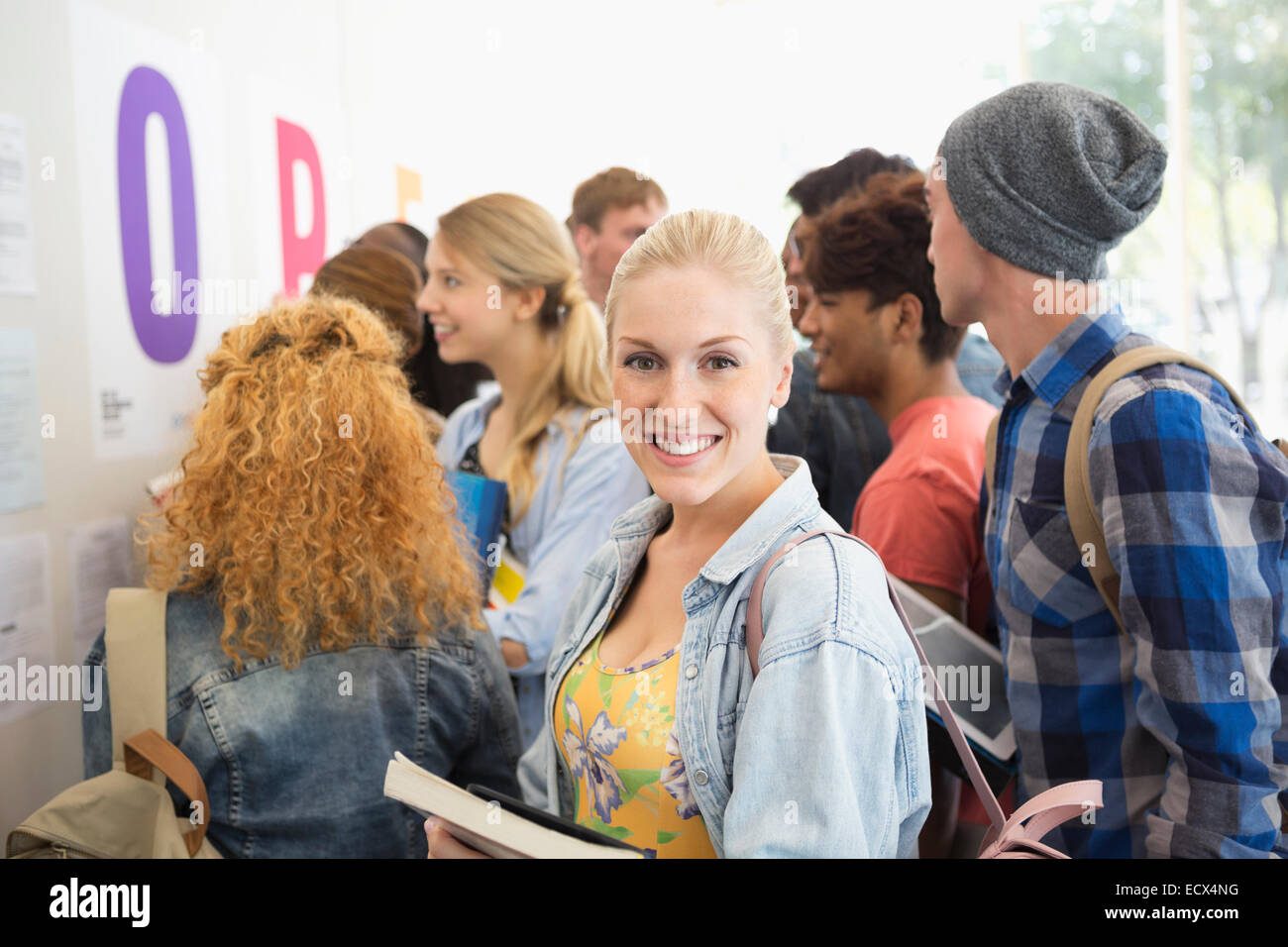 Smiling female student looking at camera Stock Photo - Alamy