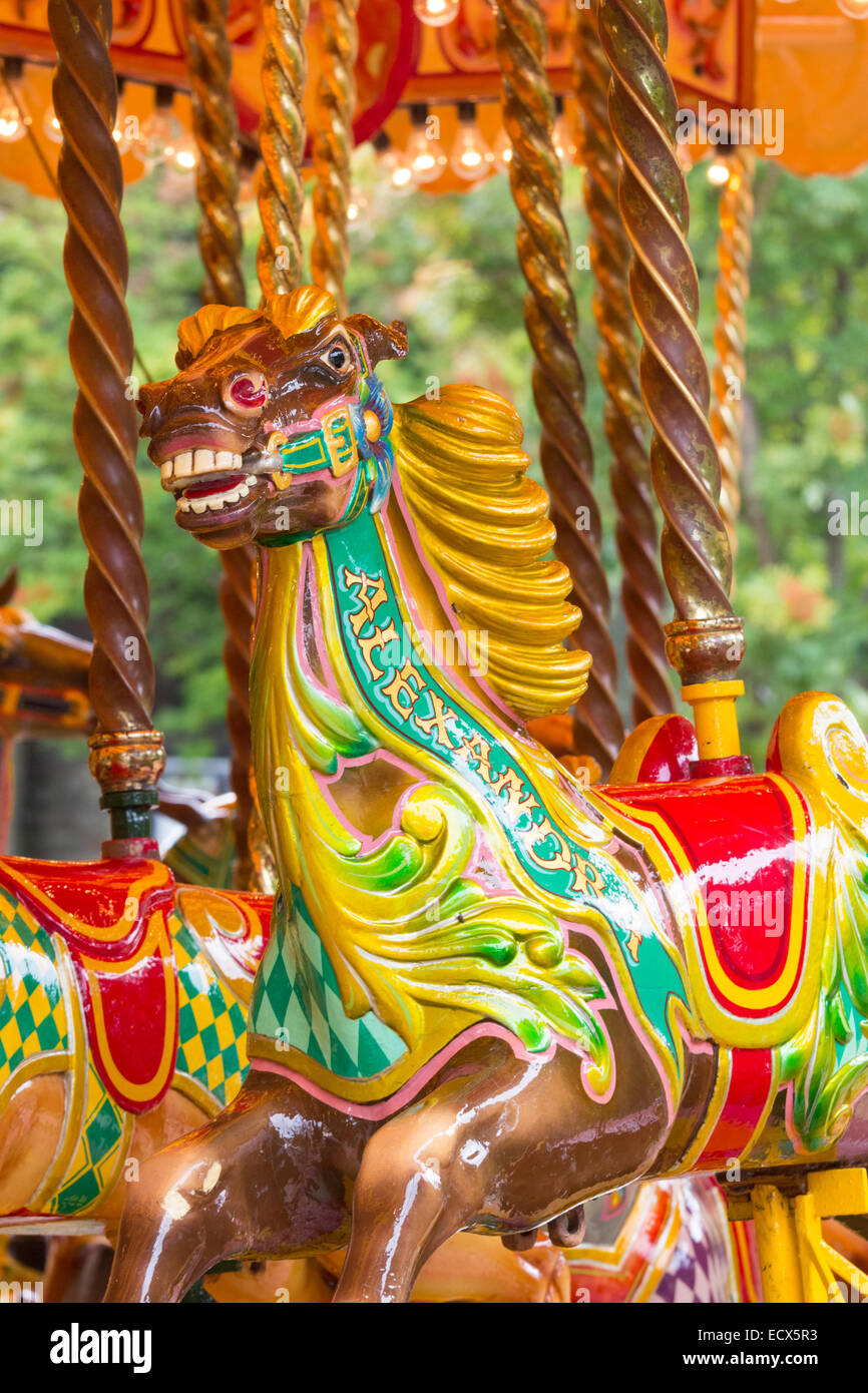 A shiny wooden horse on a vintage carousel Stock Photo - Alamy