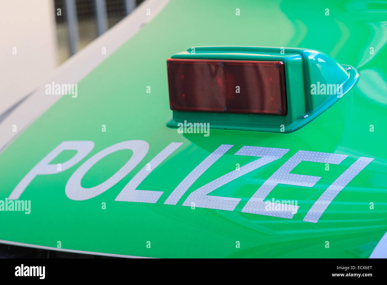 Polizei / police sign on a car's hood on green color in Germany Stock ...