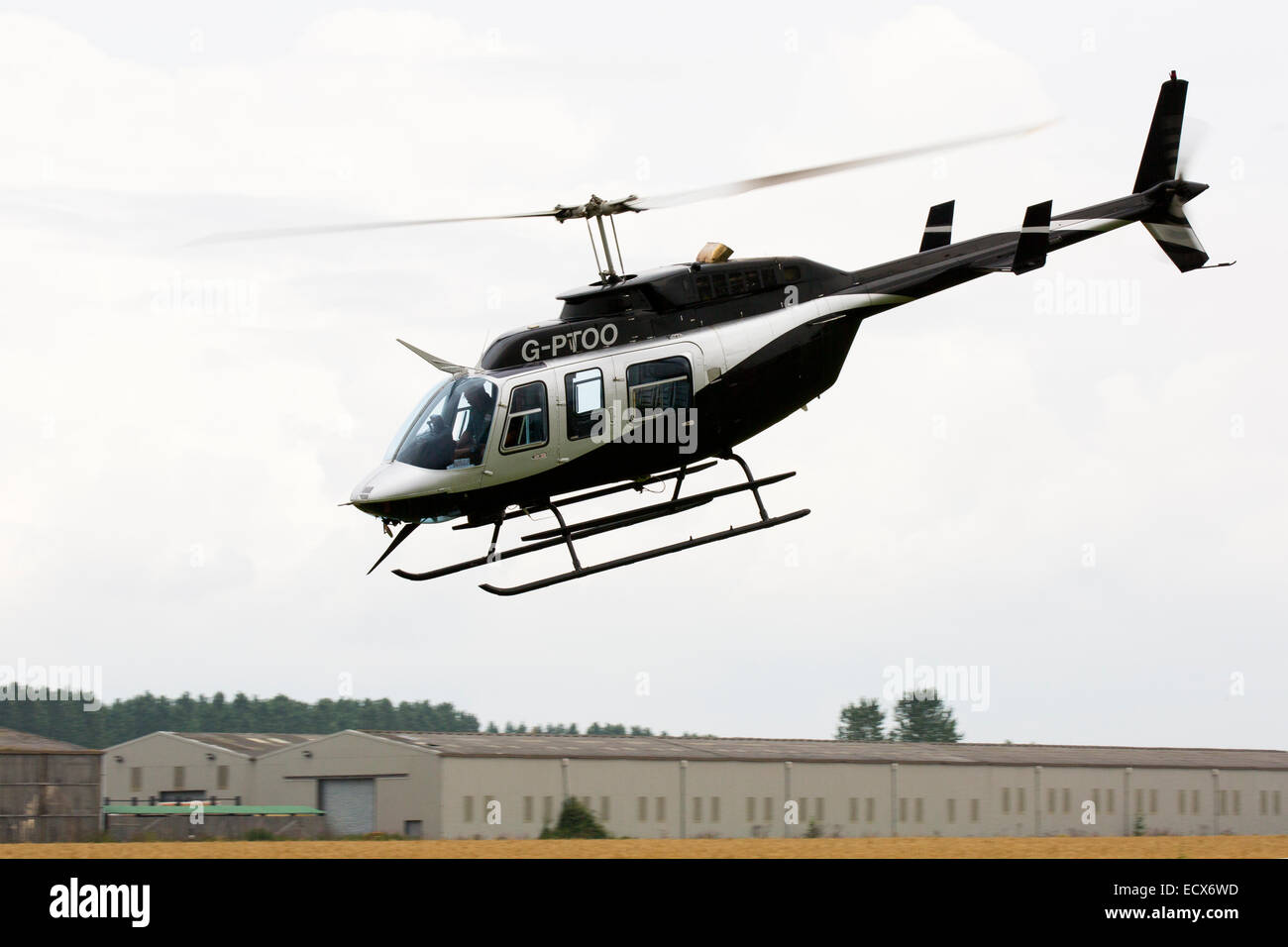 Bell 208L-4 Longranger G-PTOO in flight after take-off from Breighton ...
