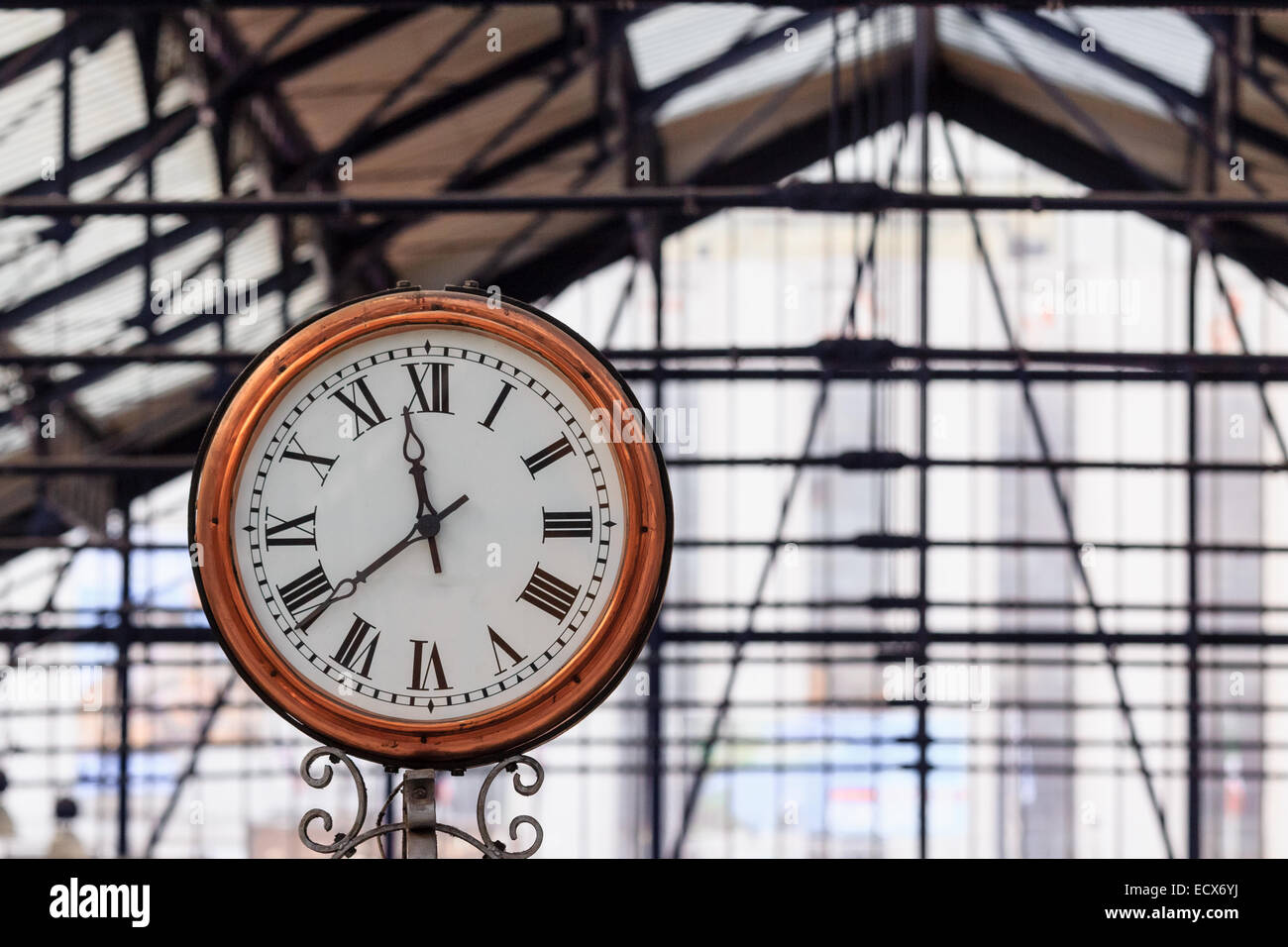 A classic clock with roman digits in London's underground station Earls ...