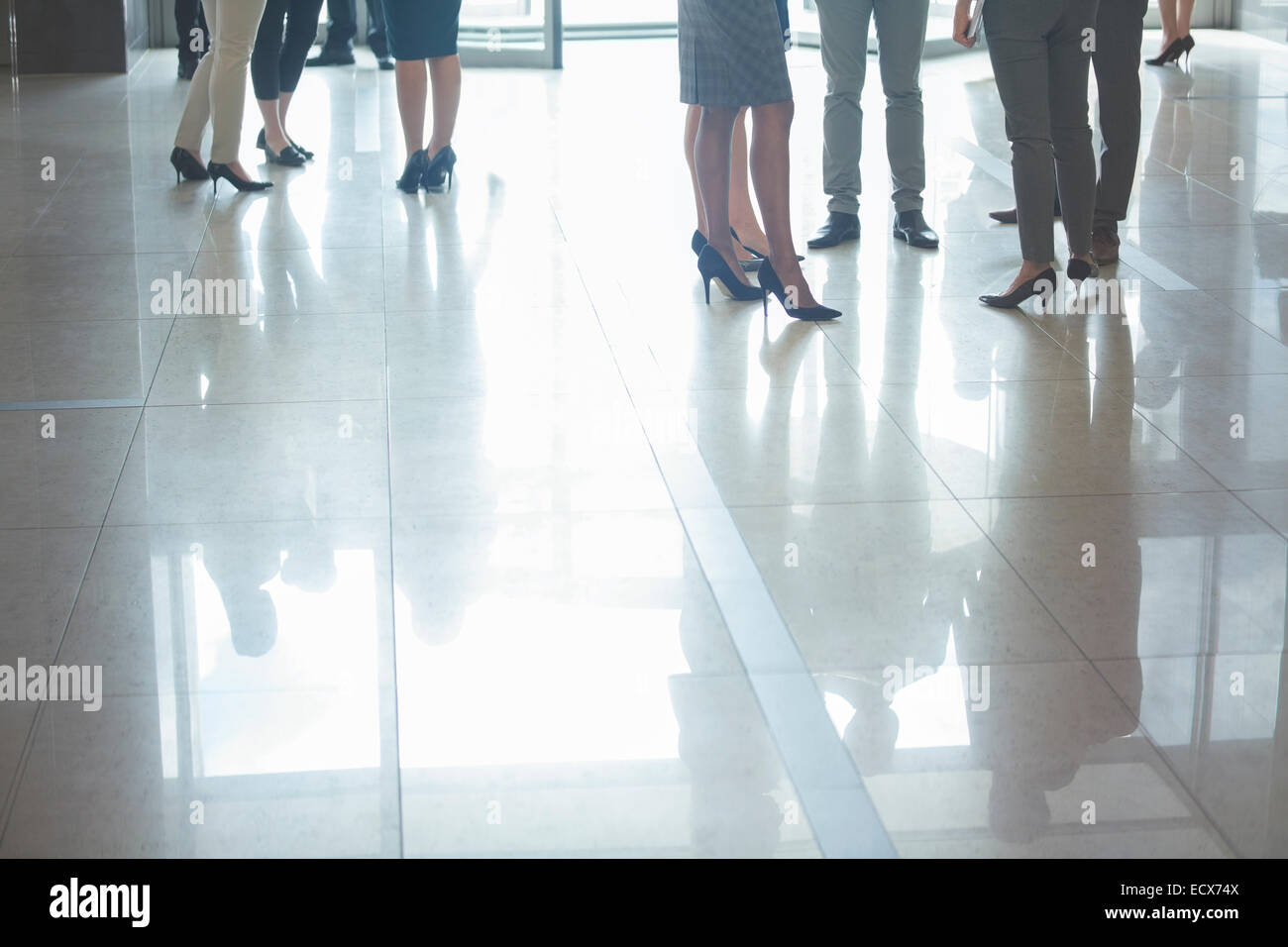 Standing on tiled floor hi-res stock photography and images - Alamy