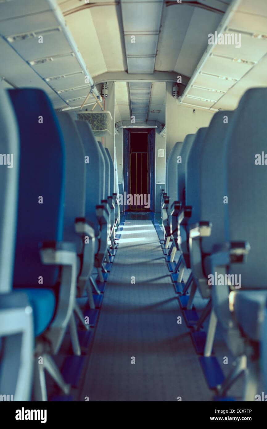 Airplane interior with seats Stock Photo - Alamy