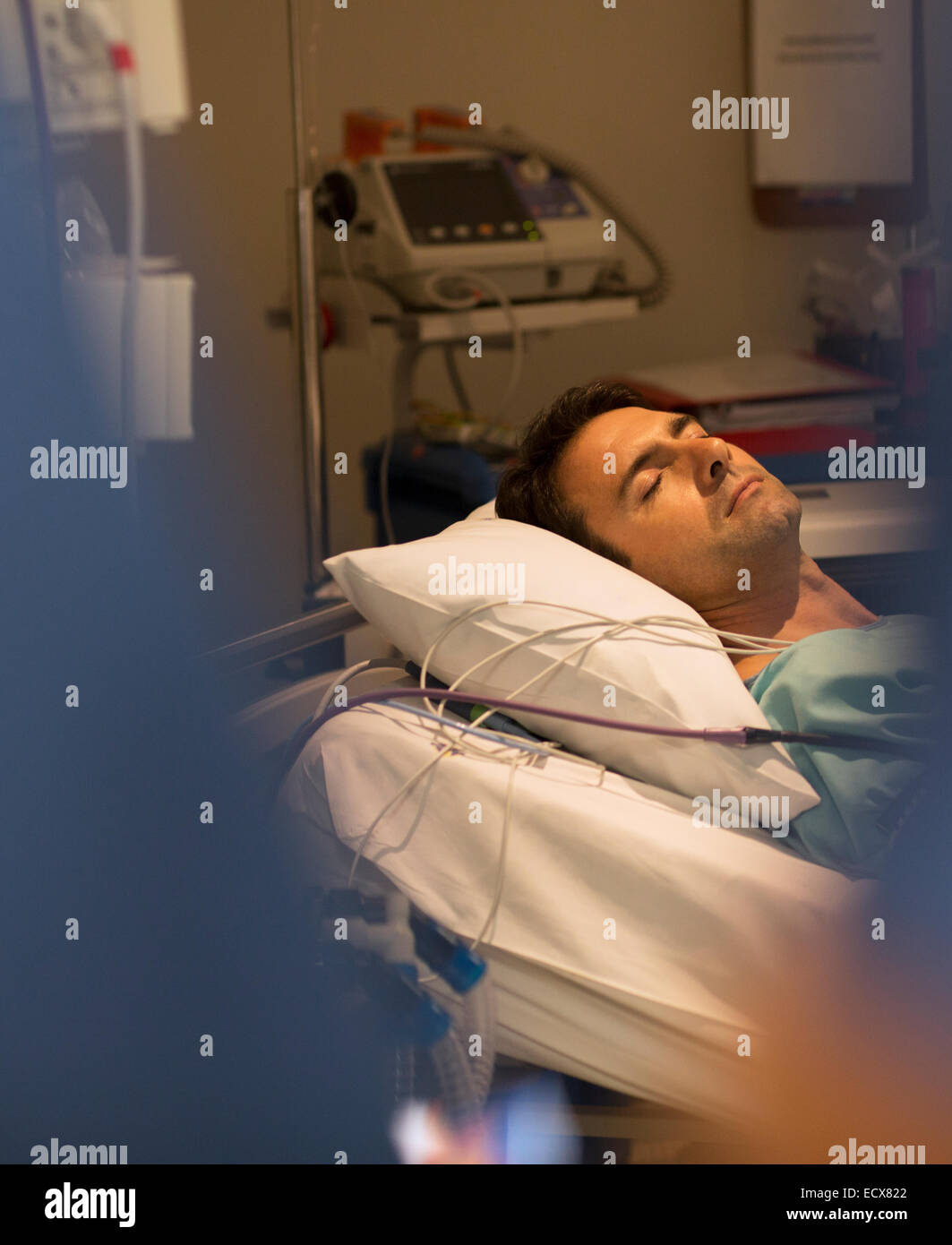 Male patient sleeping in hospital bed Stock Photo - Alamy