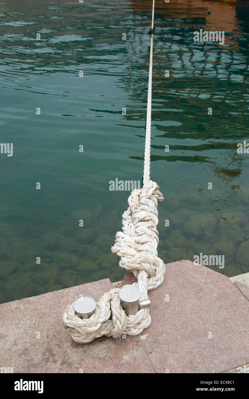 Mooring and knight with rope Stock Photo - Alamy
