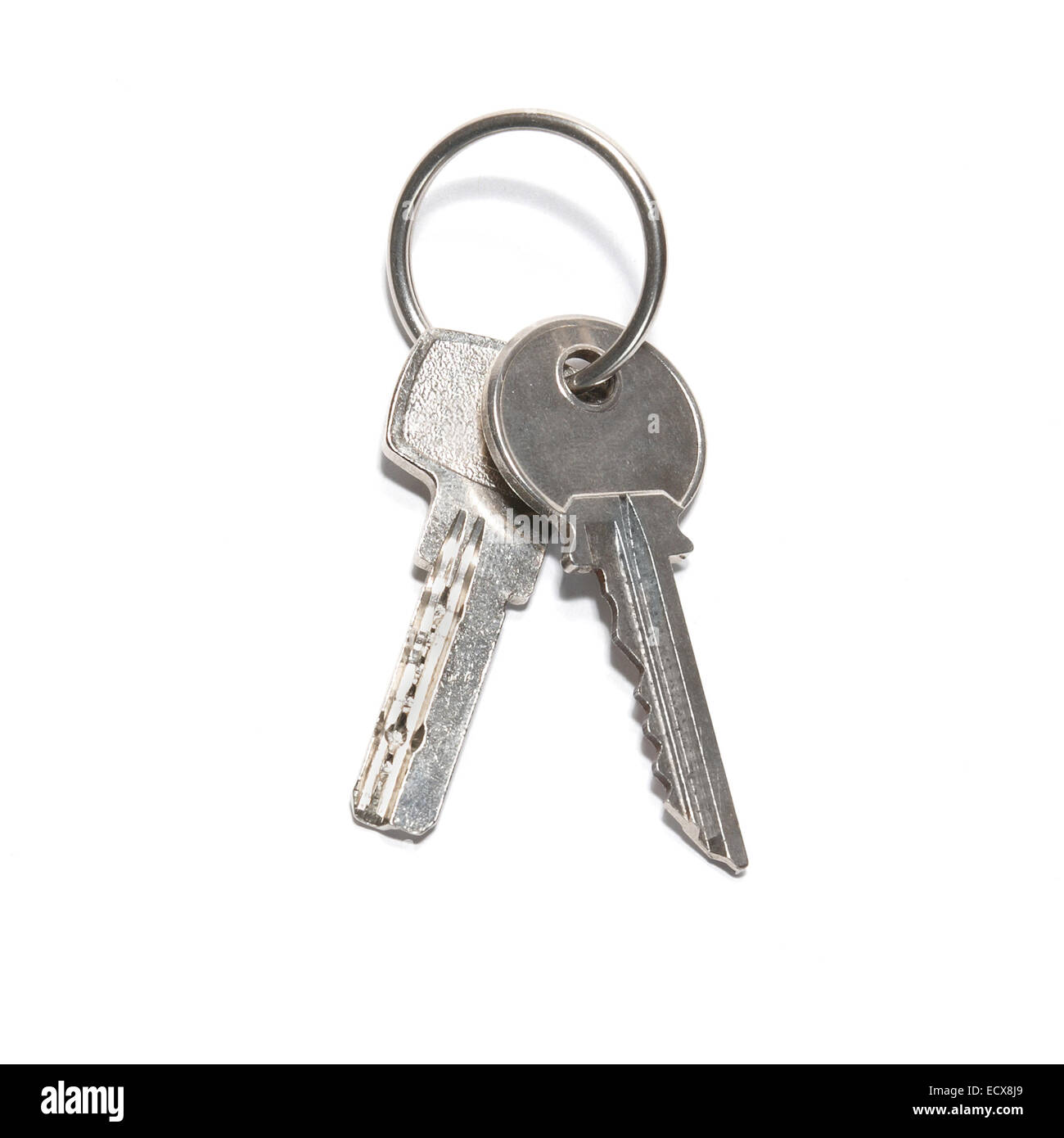 Two silver keys isolated on white background Stock Photo - Alamy