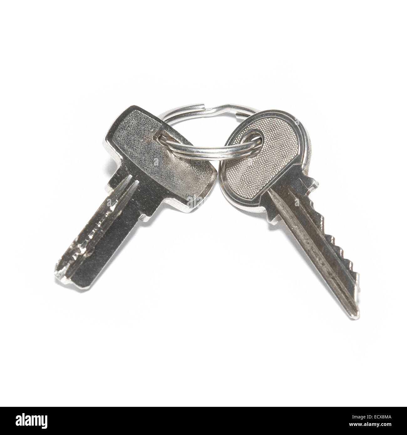 Two silver keys isolated on white background Stock Photo - Alamy