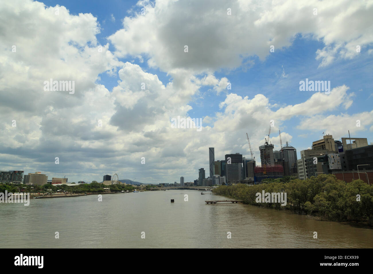 A photograph of the Brisbane River taken on a sunny day with some ...
