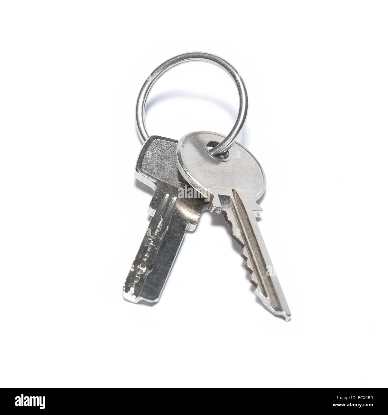 Two silver keys isolated on white background Stock Photo - Alamy