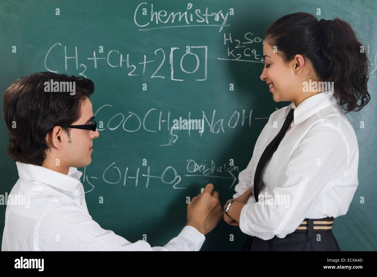 indian teacher Teaching student Stock Photo - Alamy