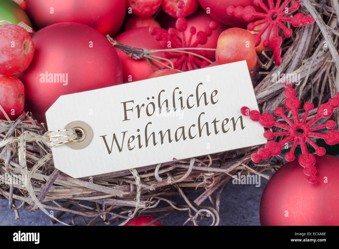 german Christmas card with christmas tree balls and text merry ...