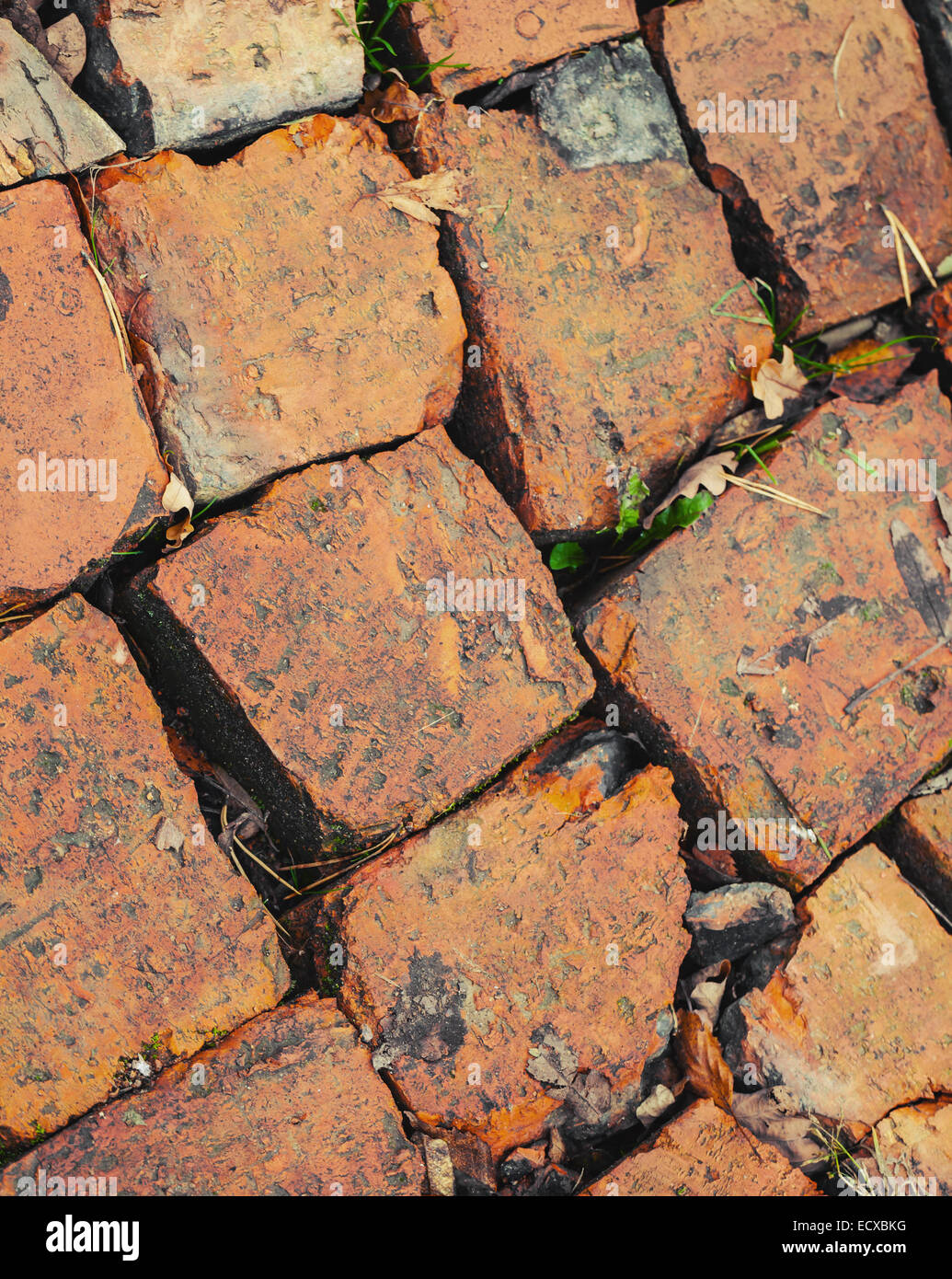 Red brick road macro fragment, photo background with vintage filter ...