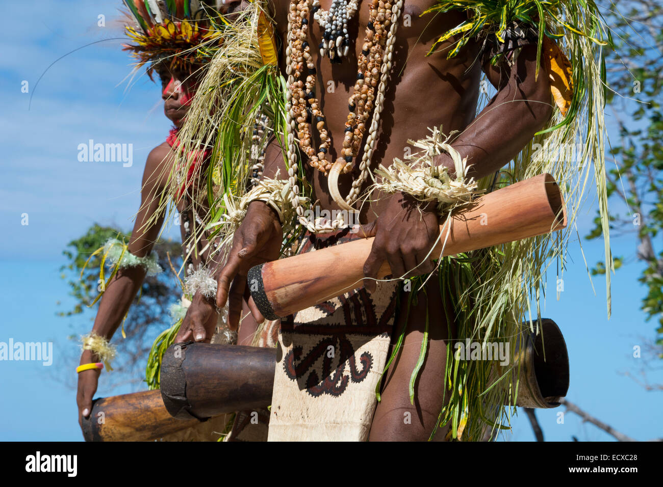 Papua New Guinea, Tufi. Traditional sing-sing, men with drums dressed ...