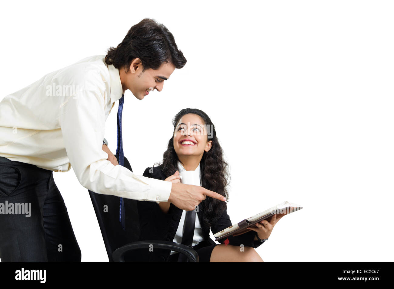 2 indian Business Colleague Employee reading diary Stock Photo - Alamy