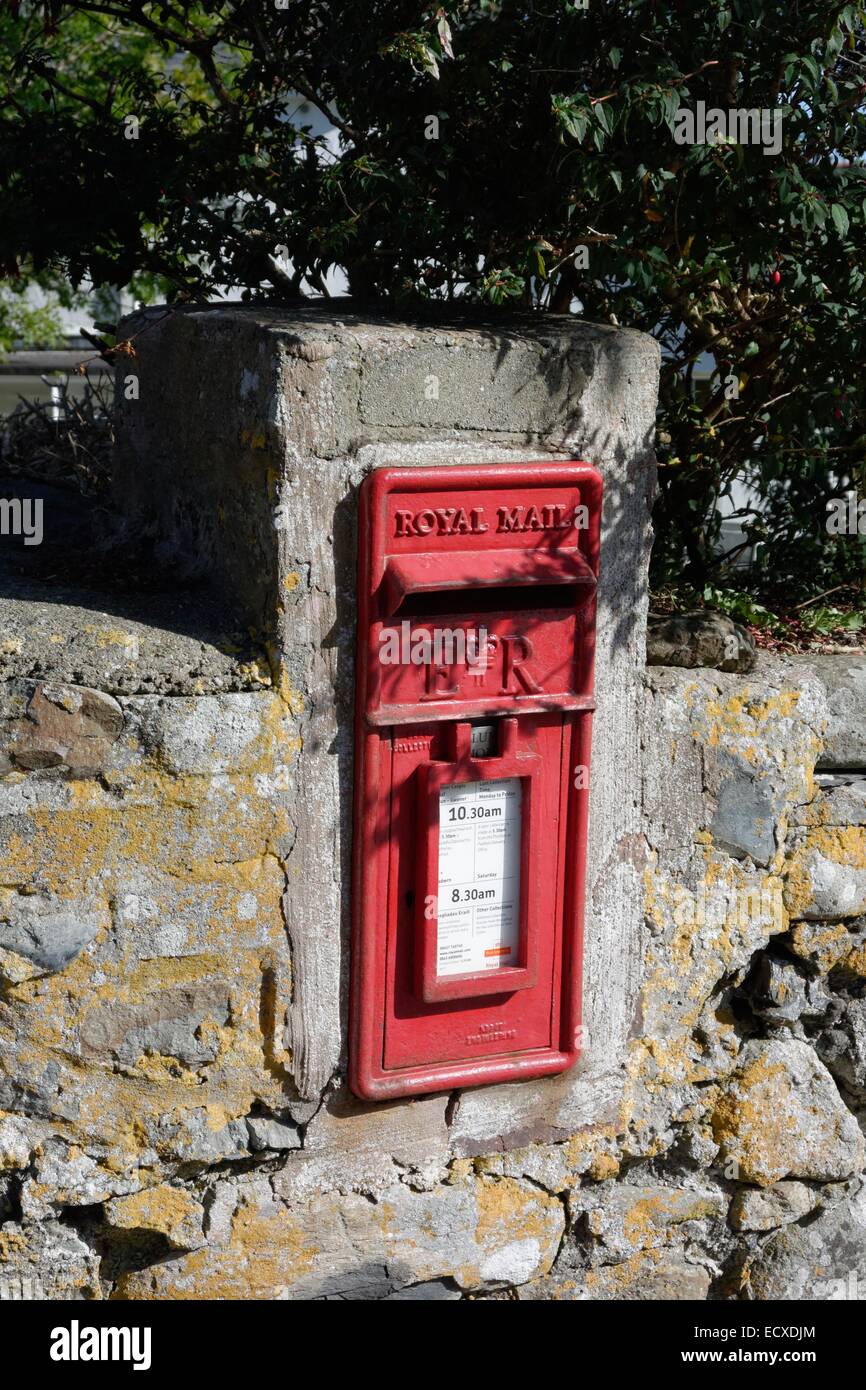 A rural 1950's iron post box set into a stone wall in North Wales Stock ...
