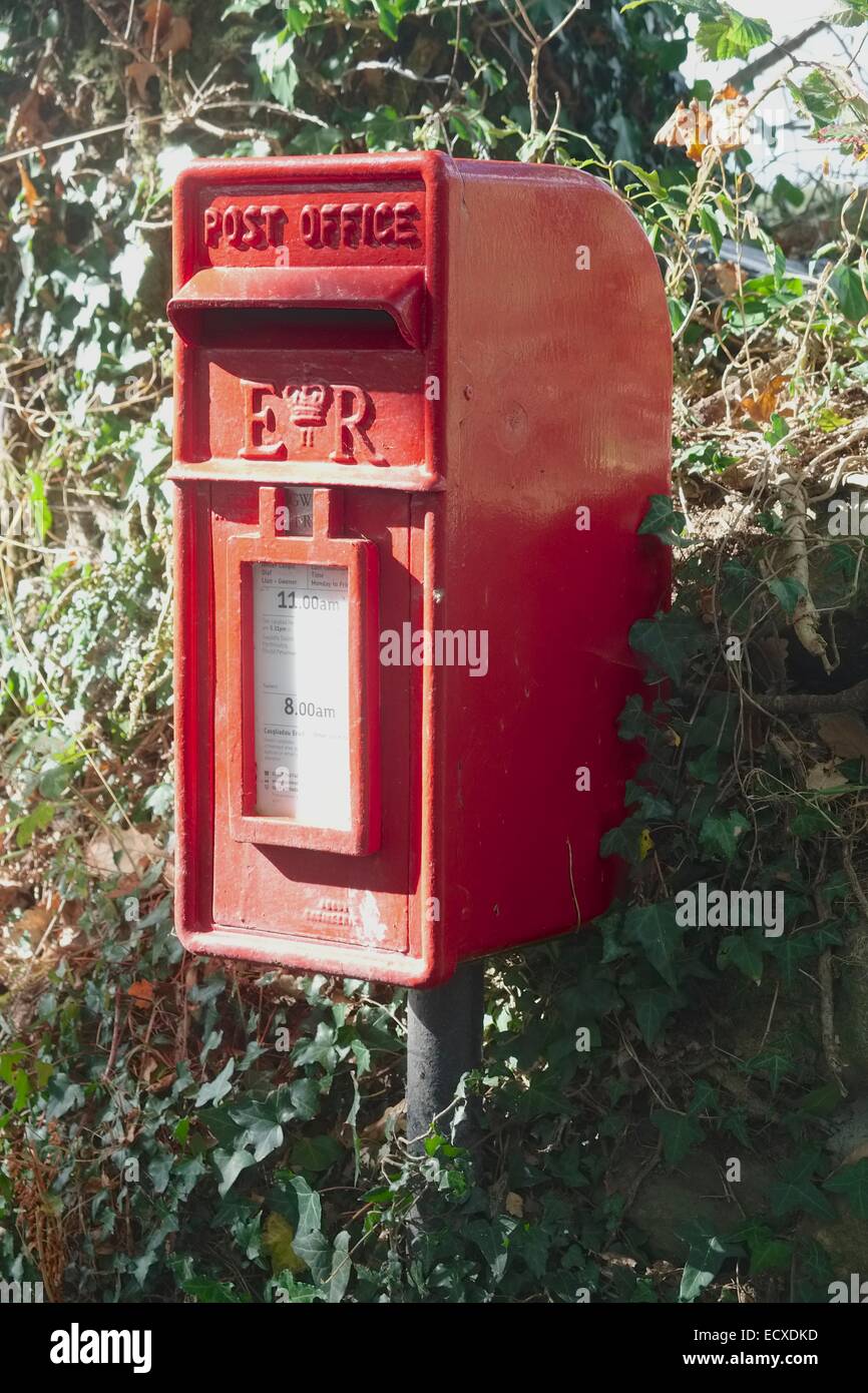 A traditional style pedestal post box in a Welsh country lane Stock ...